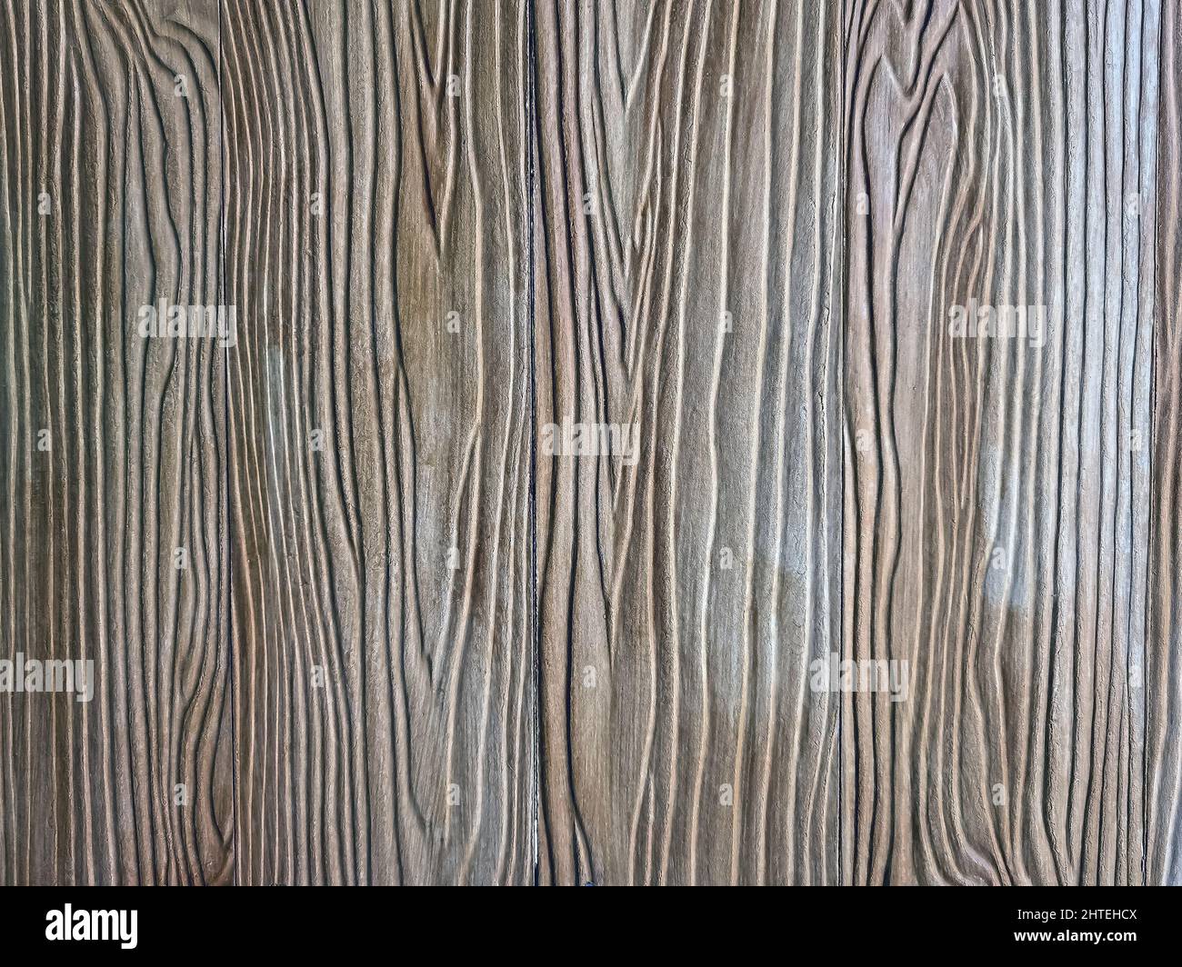 Old brown shera wood panels are patterned like real wood used in the ...