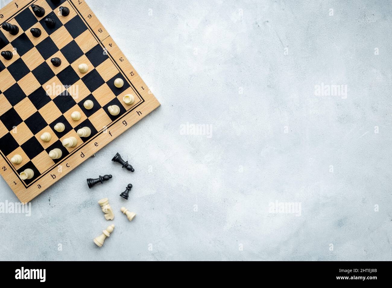 Winner of game concept. Chess pieces battle on chessboard Stock Photo ...