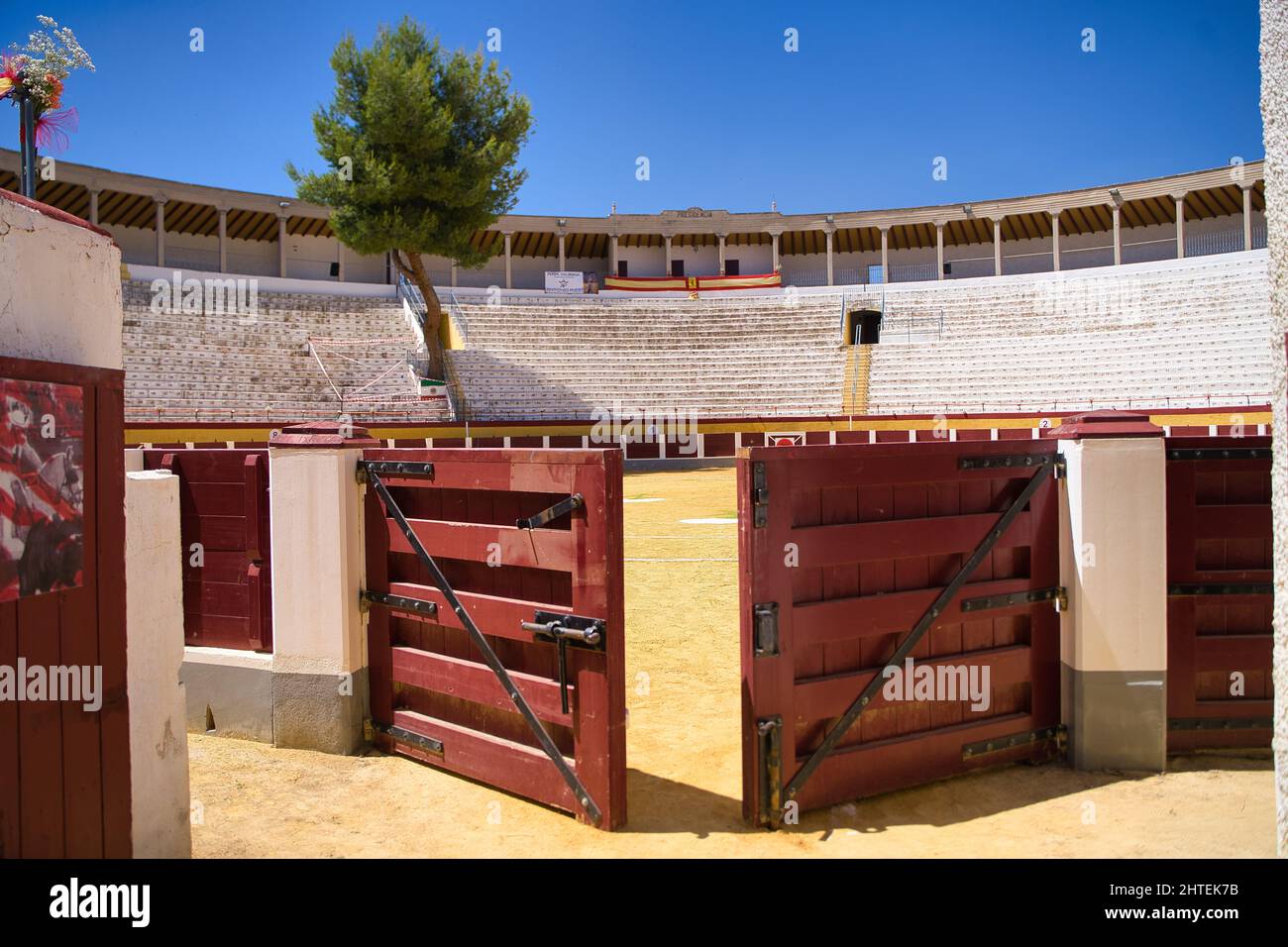 Entrance of a stadium with wooden doors Stock Photo - Alamy