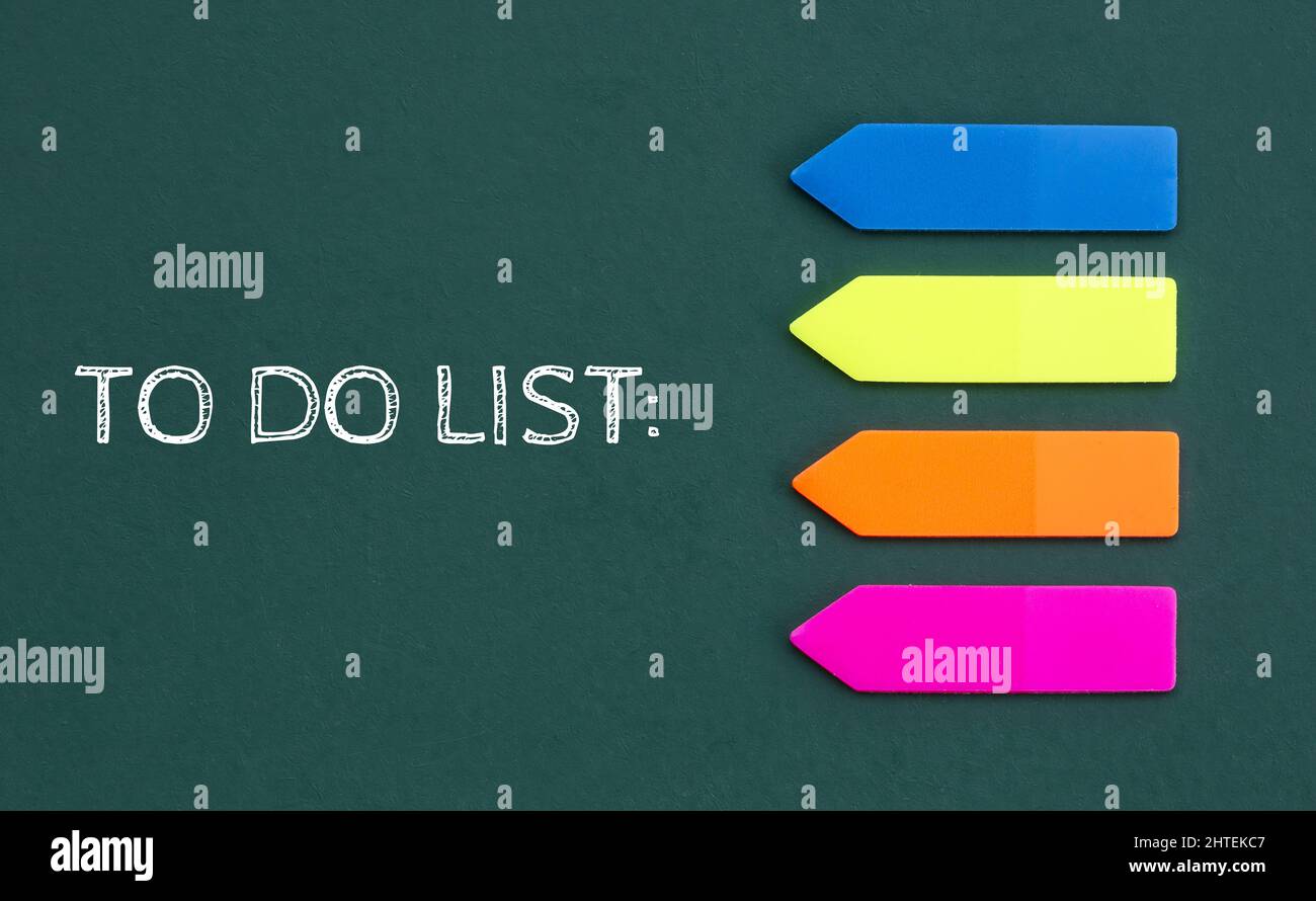 Top view of an inscription of "To Do List" with colorful stickers on ...