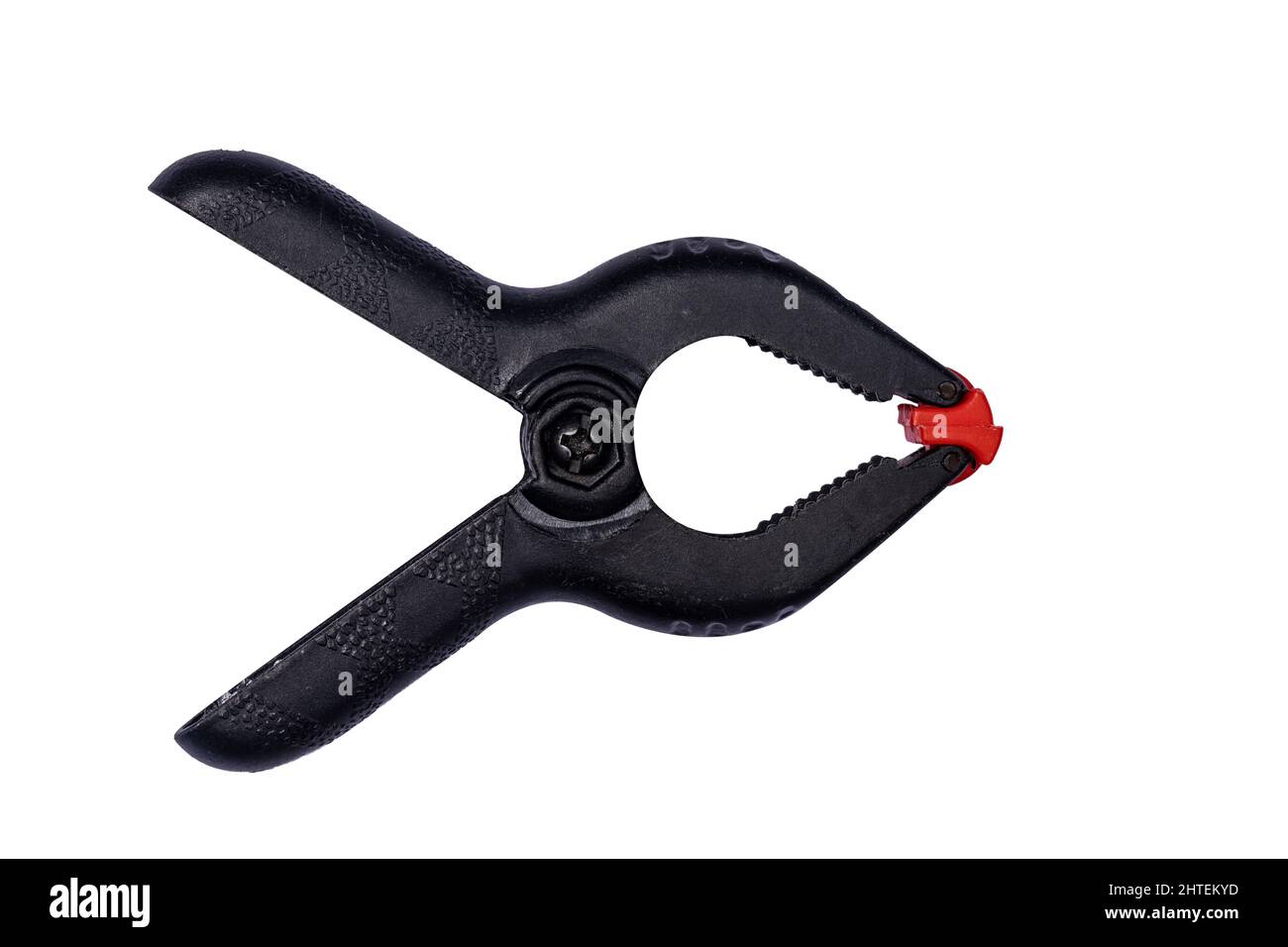 Black plastic clamp, isolated on a white background Stock Photo - Alamy