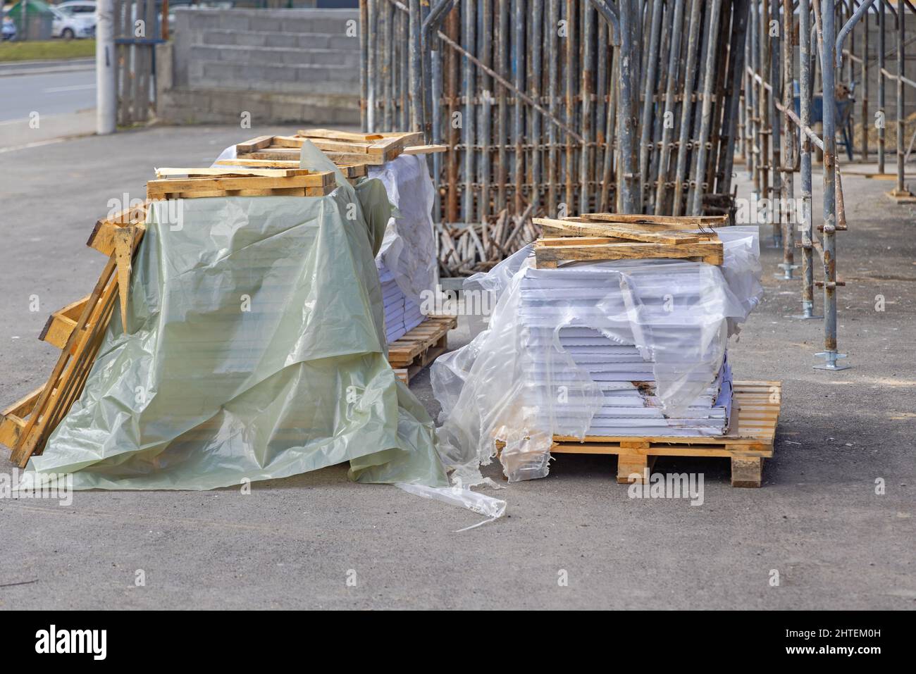 Pallets With Boxes of Material at Construction Site Stock Photo - Alamy