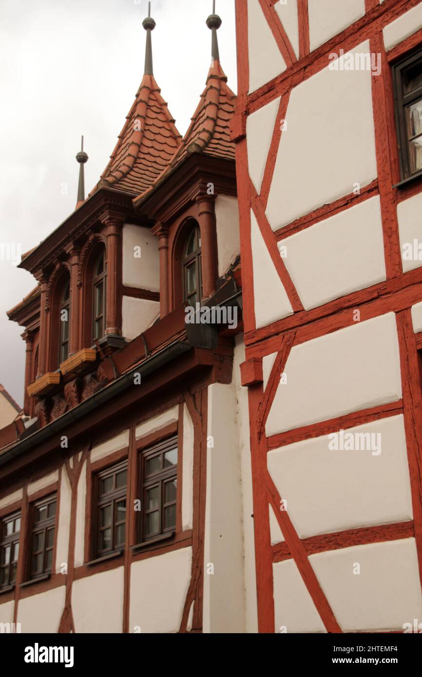 Vertical photo of traditional medieval half-timber building in ...