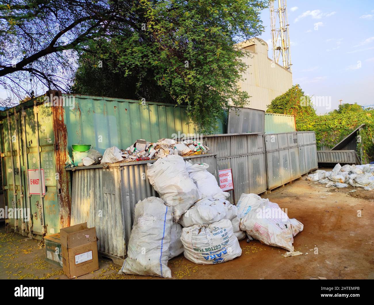 Pile of sacks outside the Indian Gujarat Sanand GIDC Automobile factory ...
