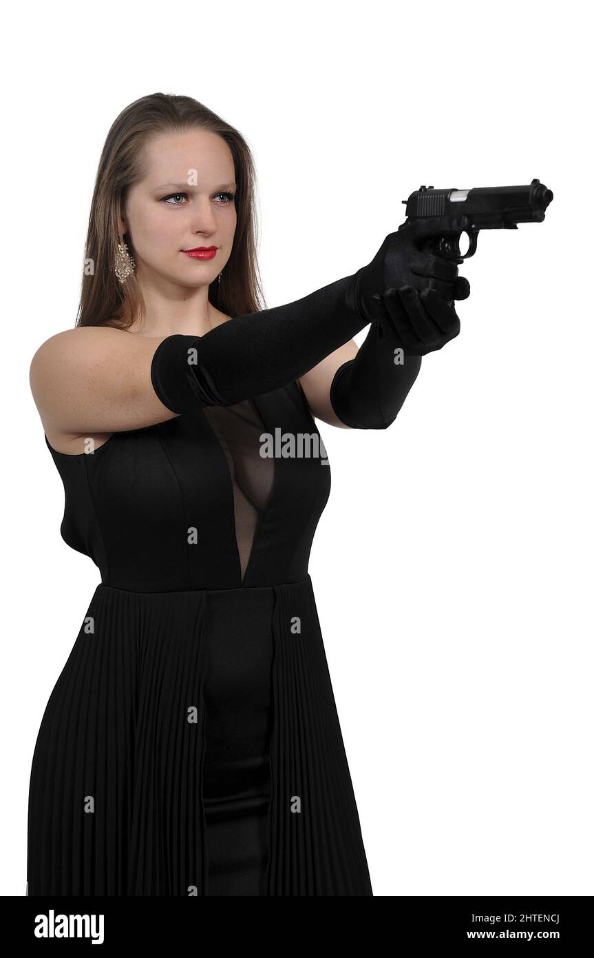 Beautiful woman with a loaded handgun pistol Stock Photo - Alamy
