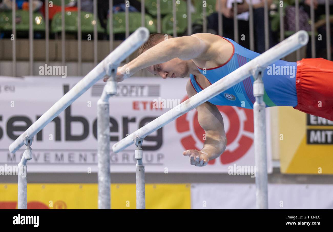 Cottbus, Germany. 27th Feb, 2022. Gymnastics: World Cup, men: parallel ...