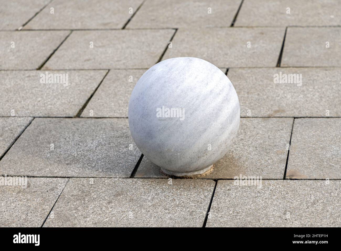 Big Marble Stone at Street Pavement Tiles Stock Photo - Alamy