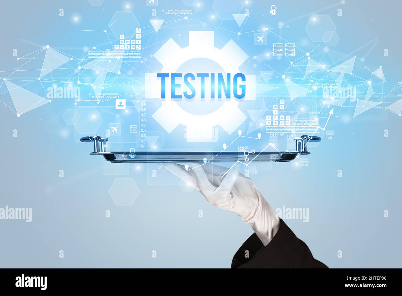 Waiter serving new technology concept Stock Photo - Alamy