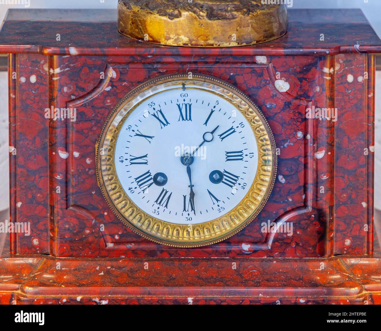Old Roman Clock in Red Marble Box Stock Photo - Alamy