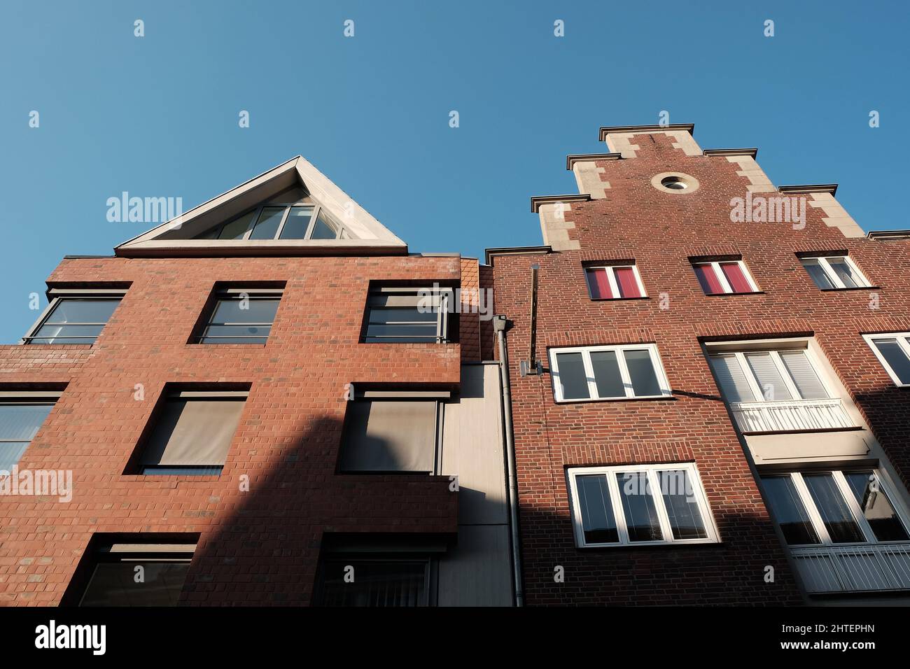 Three storey brick building hi-res stock photography and images - Alamy