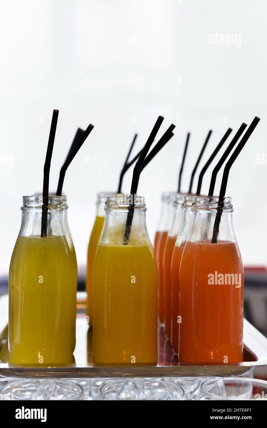 Closeup shot of different types of juices in a glass bottles Stock ...