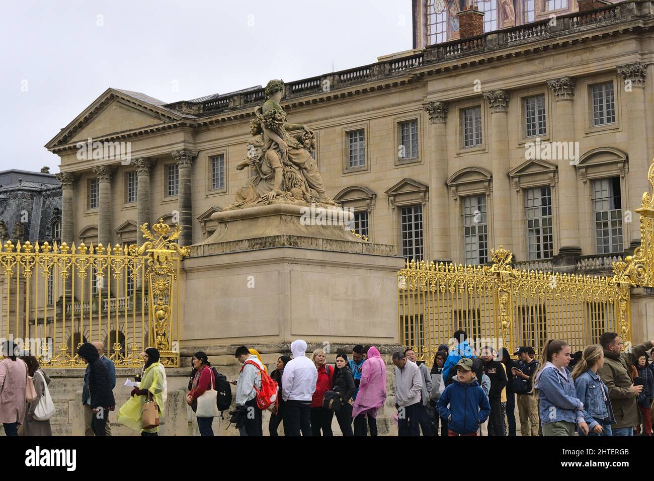 Crowd waiting to enter the Versailles Palace in Paris, France Stock ...