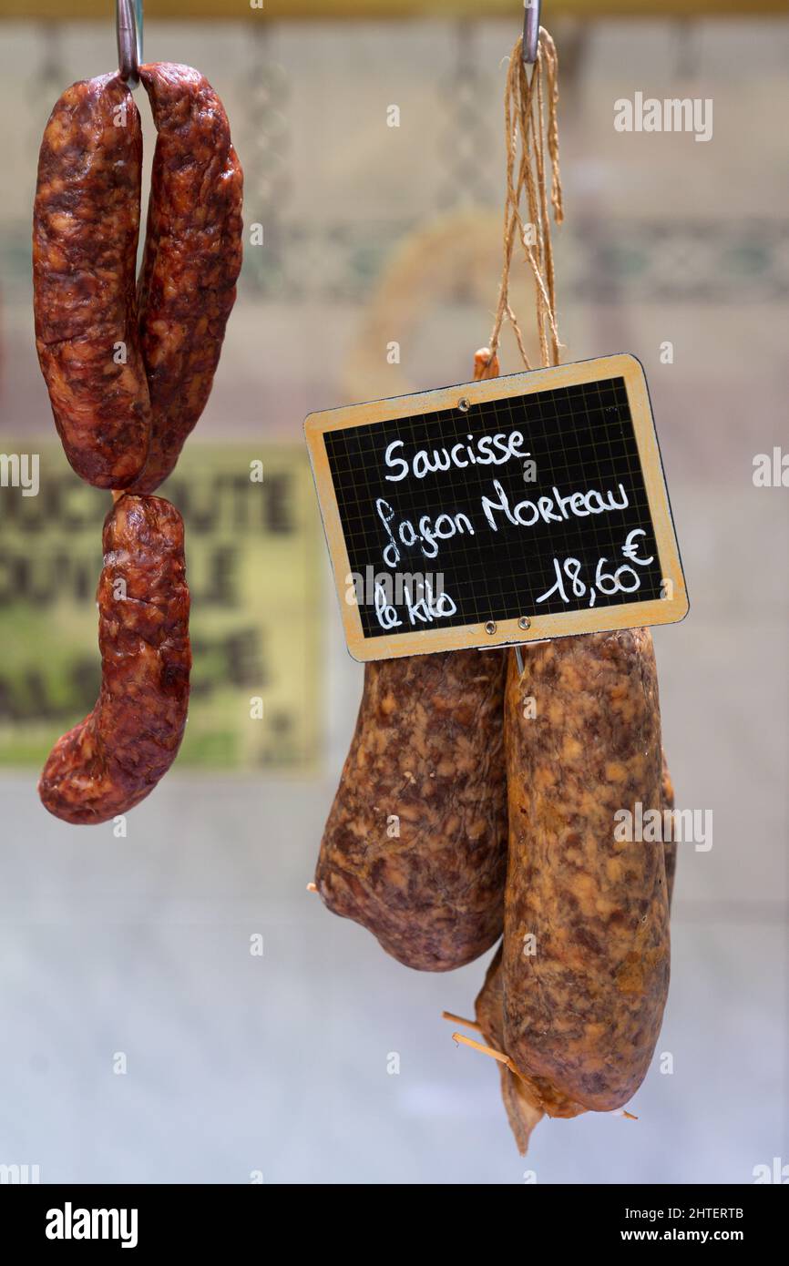 Vertical shot of the delicious meat assortment in a French traditional ...