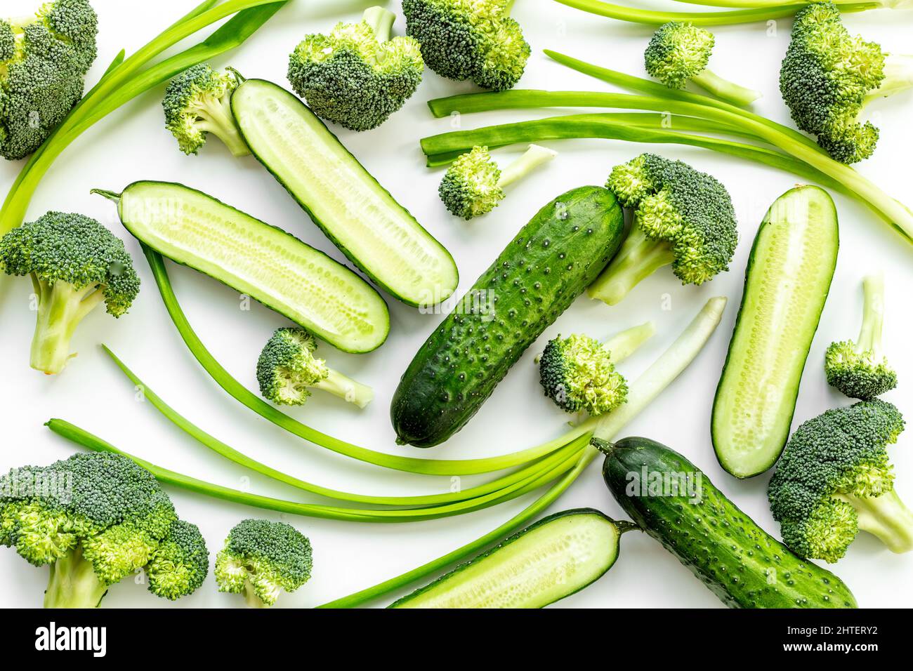 Pattern of green vegetables with broccoli and cucumber. Food background ...