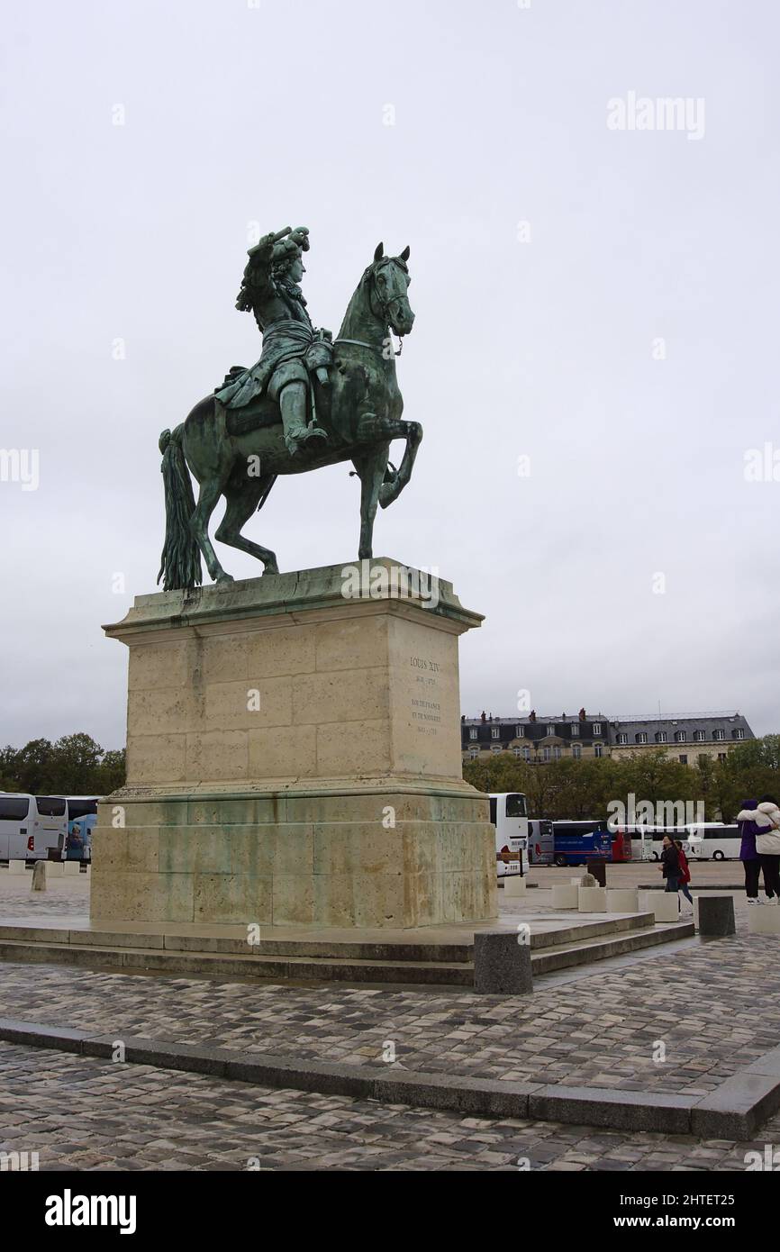 Vertical shot of the Louis XIV monument in front of Versailles Palace ...