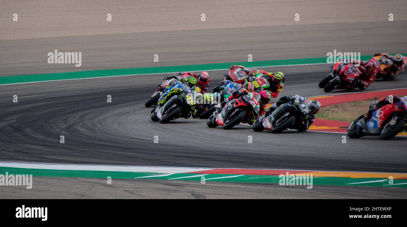 Moto racers at the turn during the first lap of the competition Stock ...