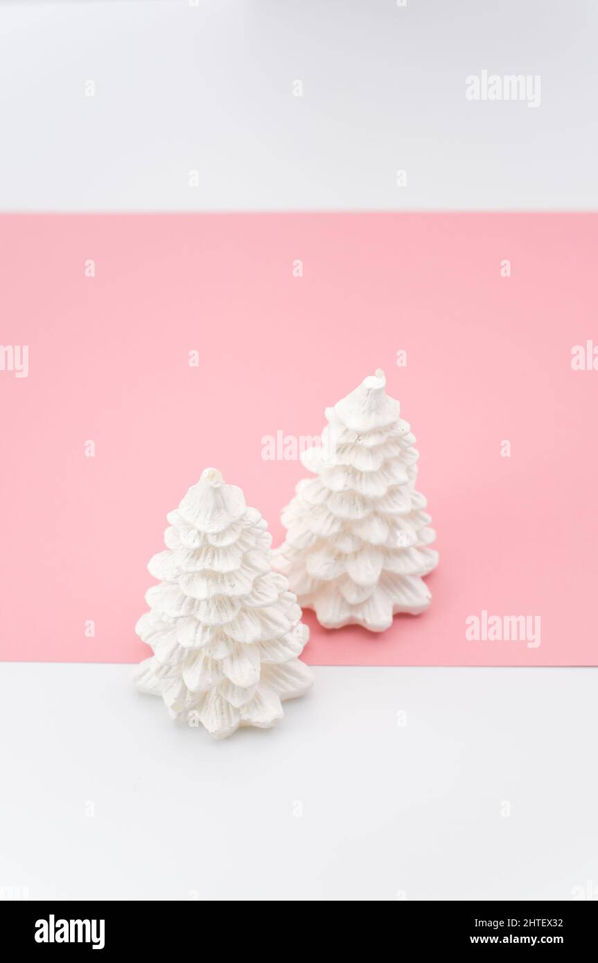 decorative white wax fir trees on a white and pink background Stock ...