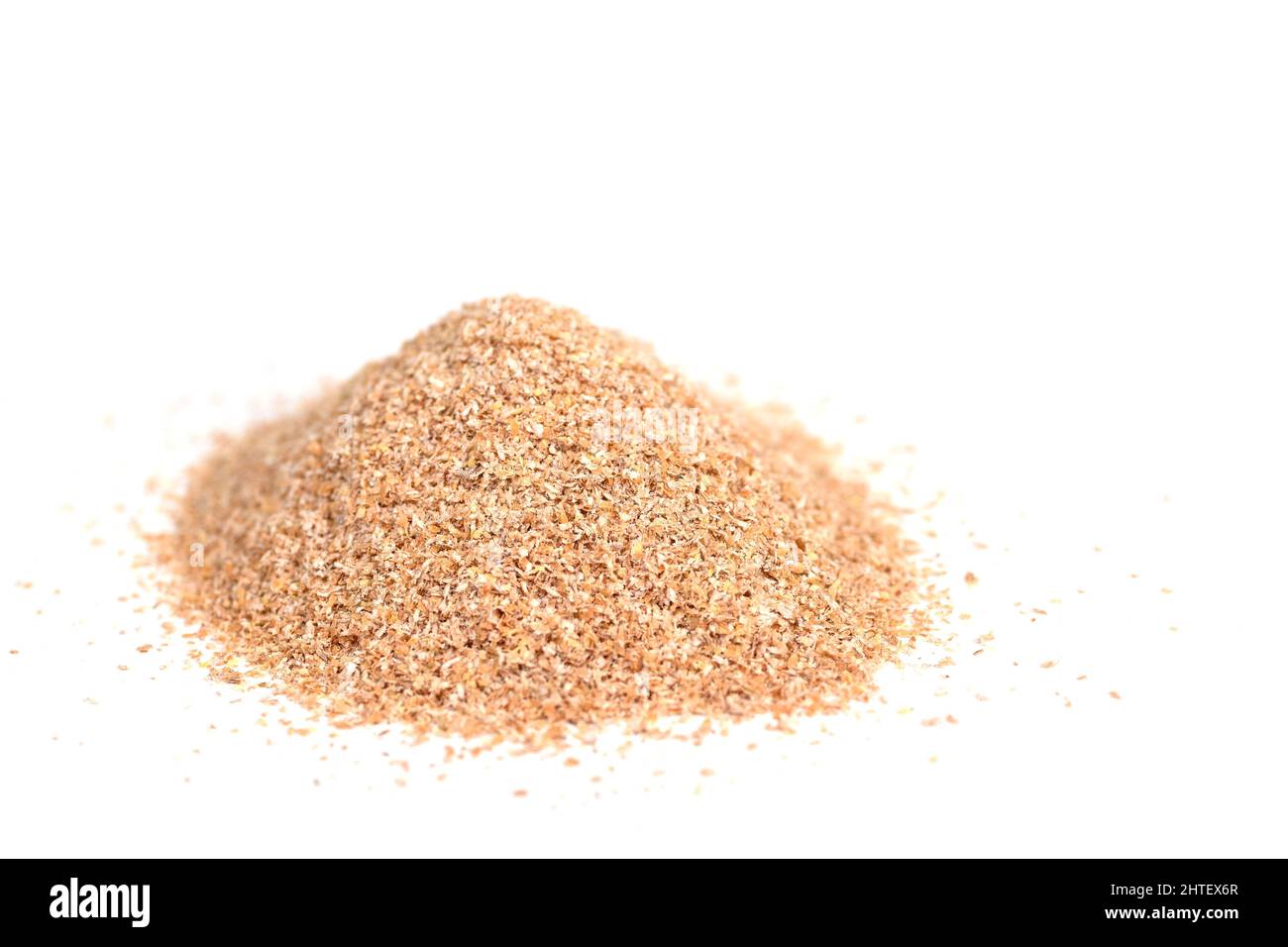 Wheat bran isolated against white background Stock Photo - Alamy