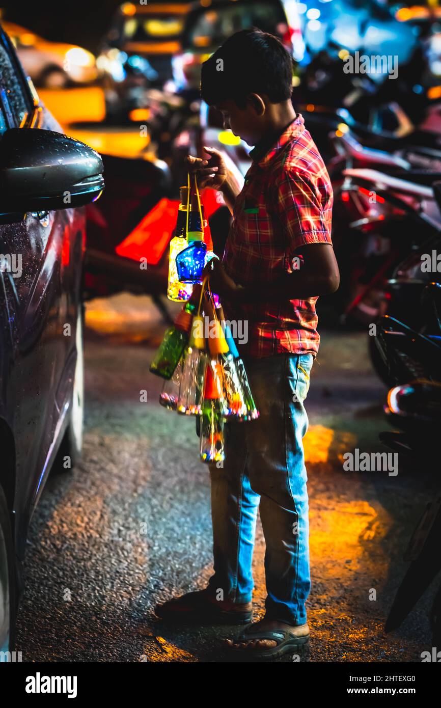 Selling lights in darkness Stock Photo - Alamy