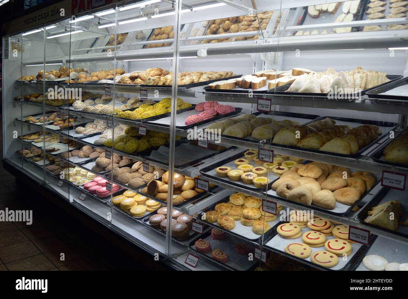 Close up shot of Mexican pastries in a display case in a Mexican market ...
