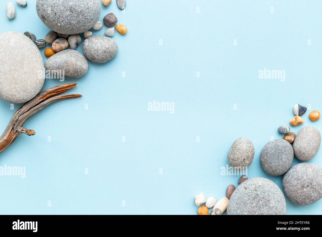 Frame of natural mineral rocks with snag tree branch Stock Photo - Alamy
