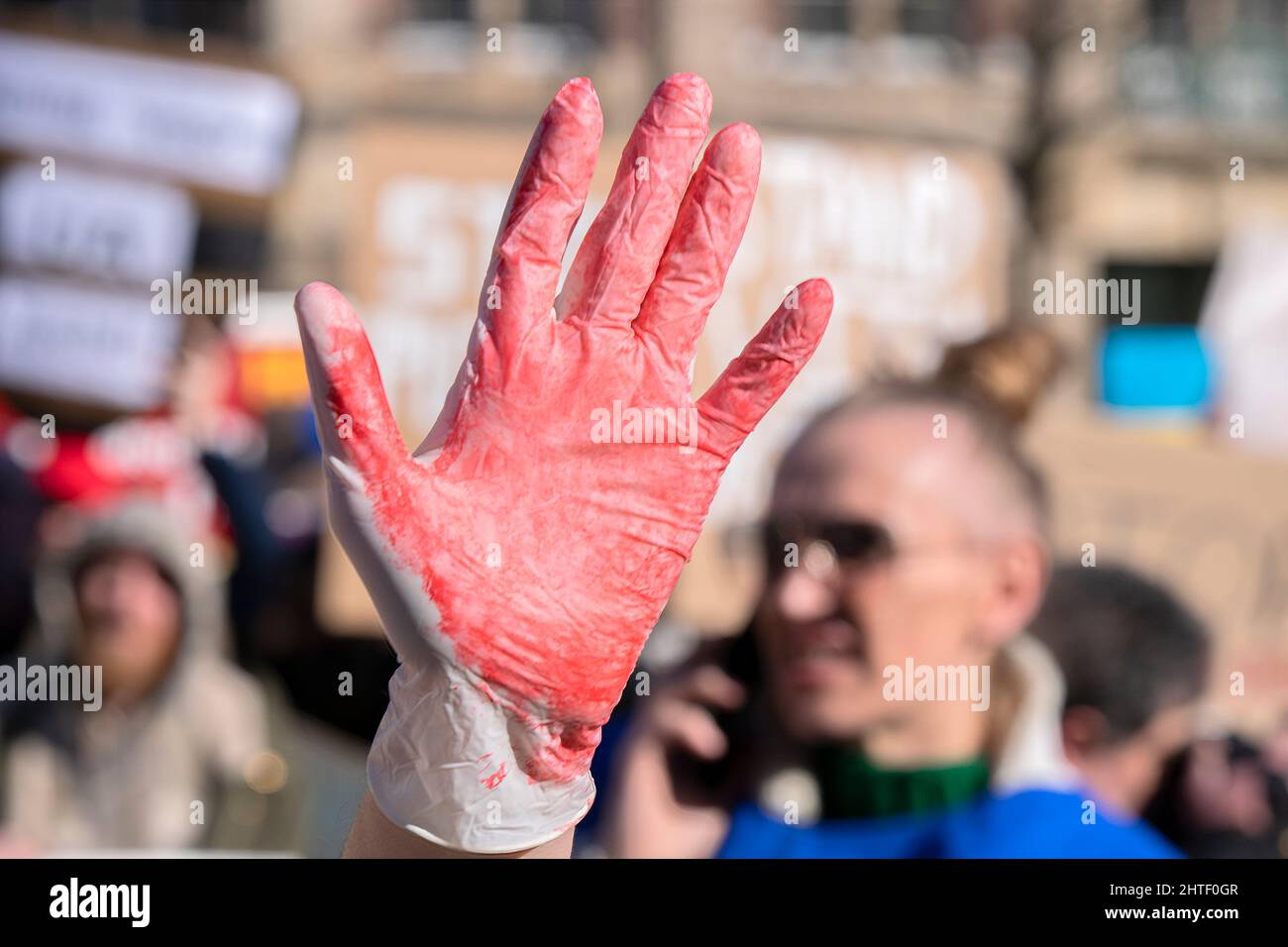 Our blood your hands protest sign hi-res stock photography and images ...