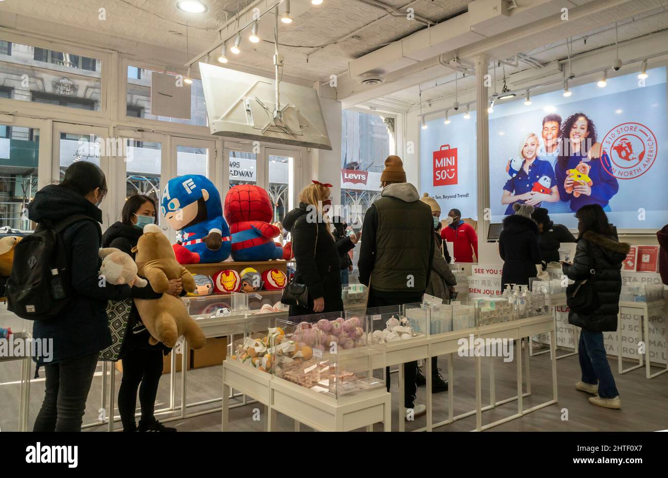 Shoppers in the new MINISO store in the Soho neighborhood of New York ...