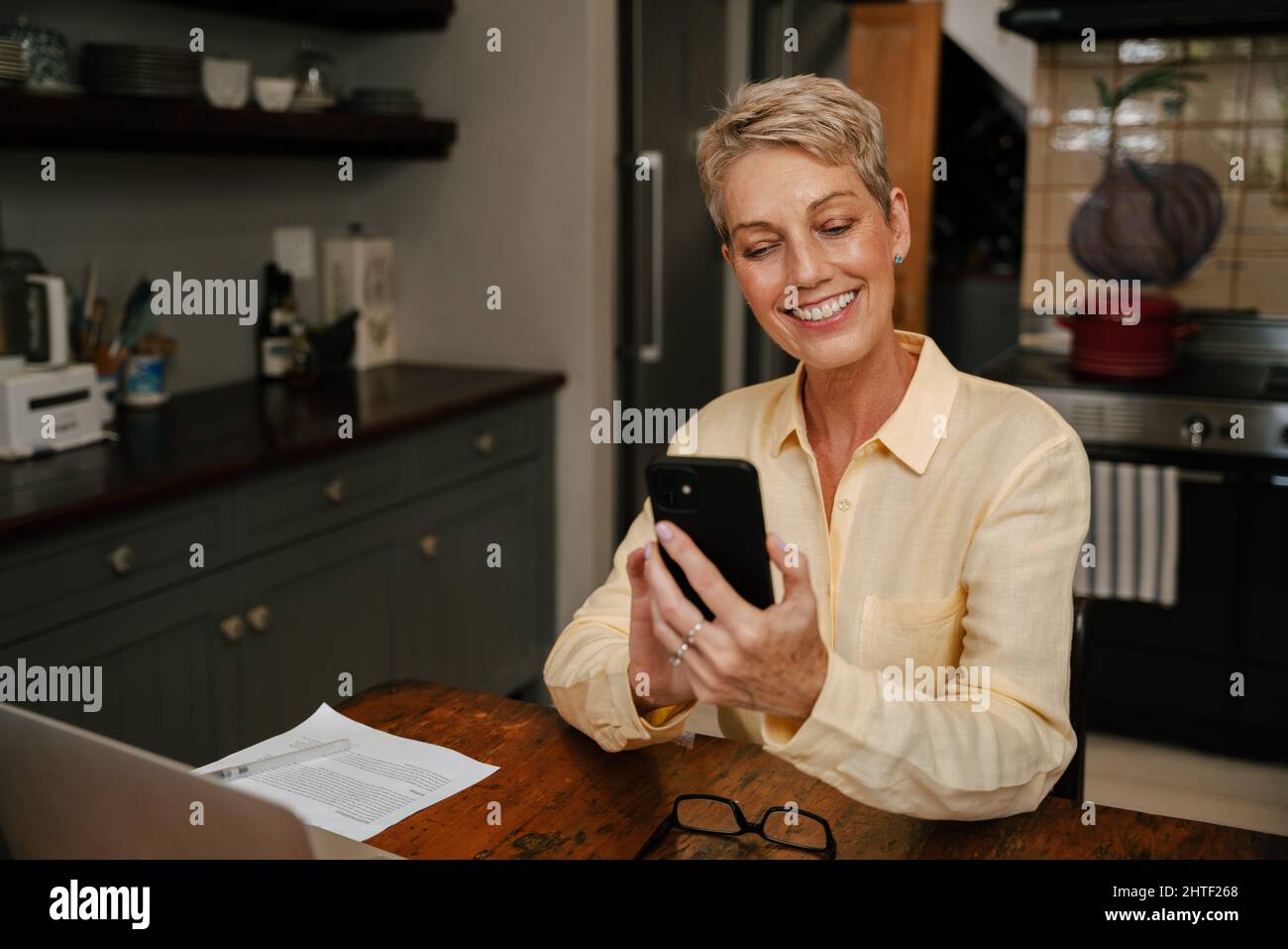 Business woman texting smiling outside hi-res stock photography and ...