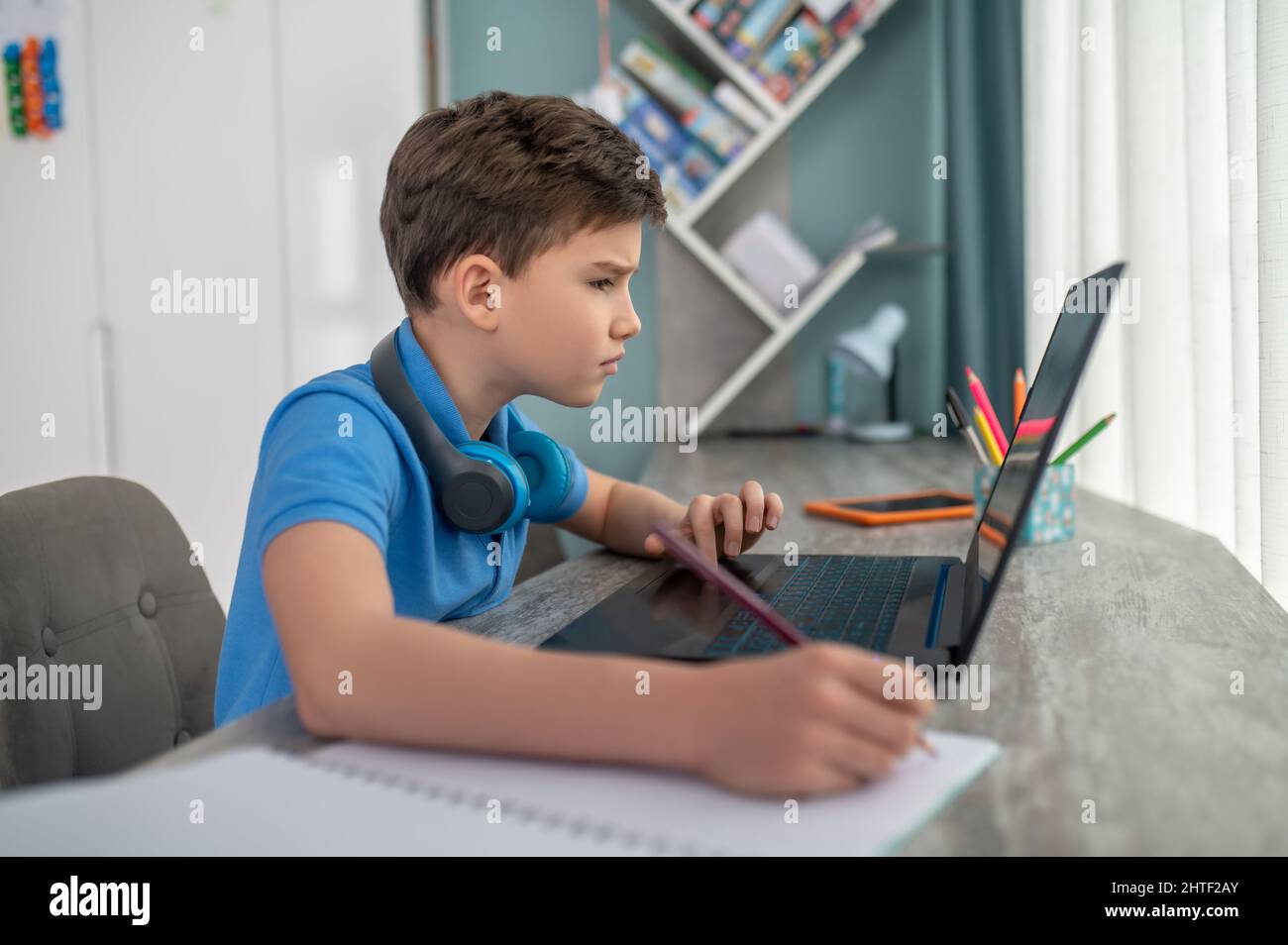 Person staring at computer screen hi-res stock photography and images ...
