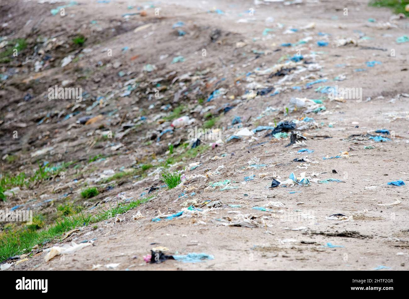 Plastic garbages that take time to decompose in the ground Stock Photo ...