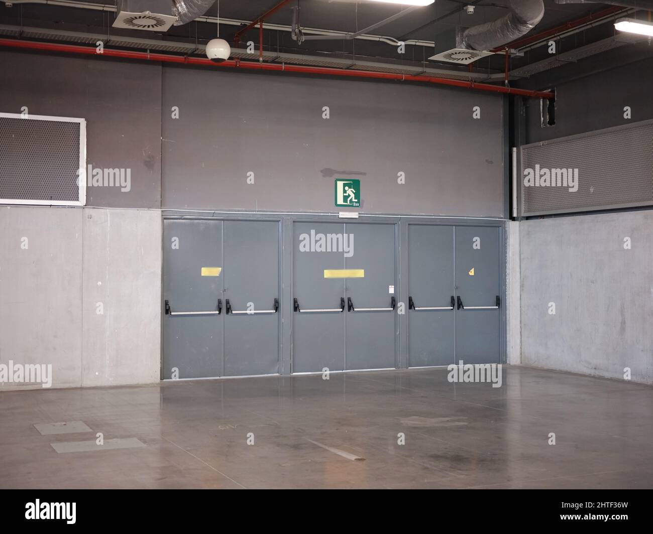 Emergency exit doors of a car parking space Stock Photo - Alamy