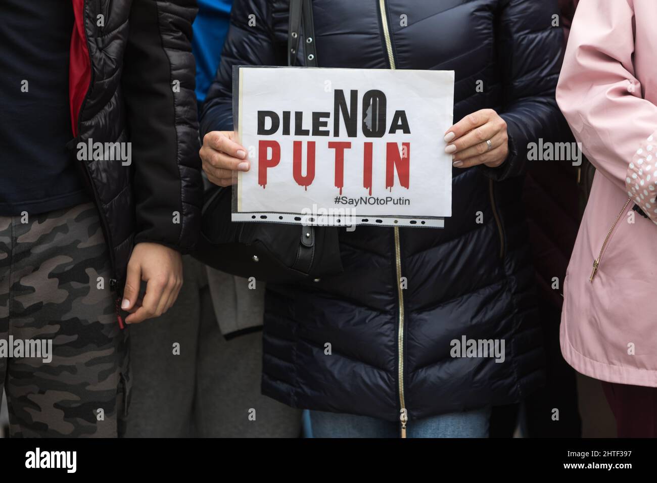 Demonstration against Russia's invasion of Ukraine with signs saying ...