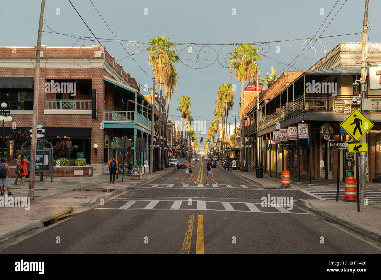 Tourists crossing 7th Avenue in Ybor City Historic District Stock Photo ...