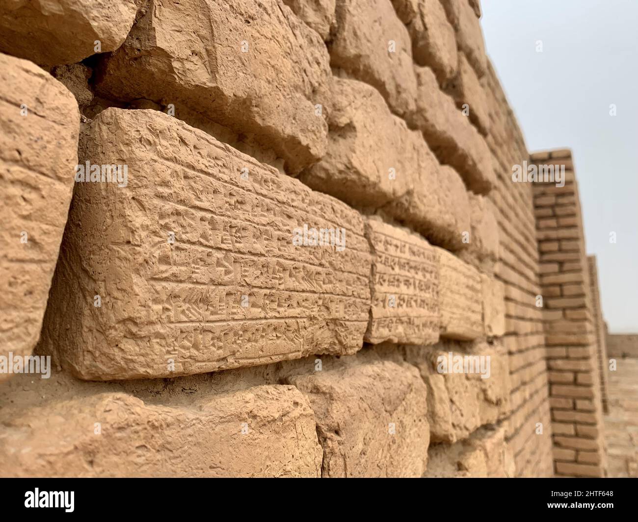 Ancient stone wall with Cuneiform text and script in Mesopotamia ...