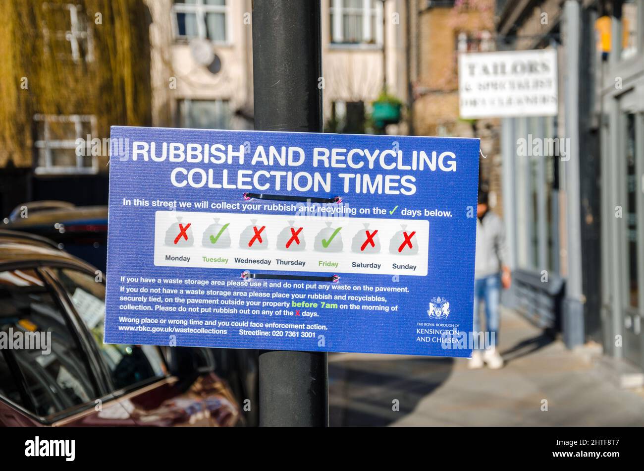 A sign attached to a lamppost in Earl's Court, London giving ...