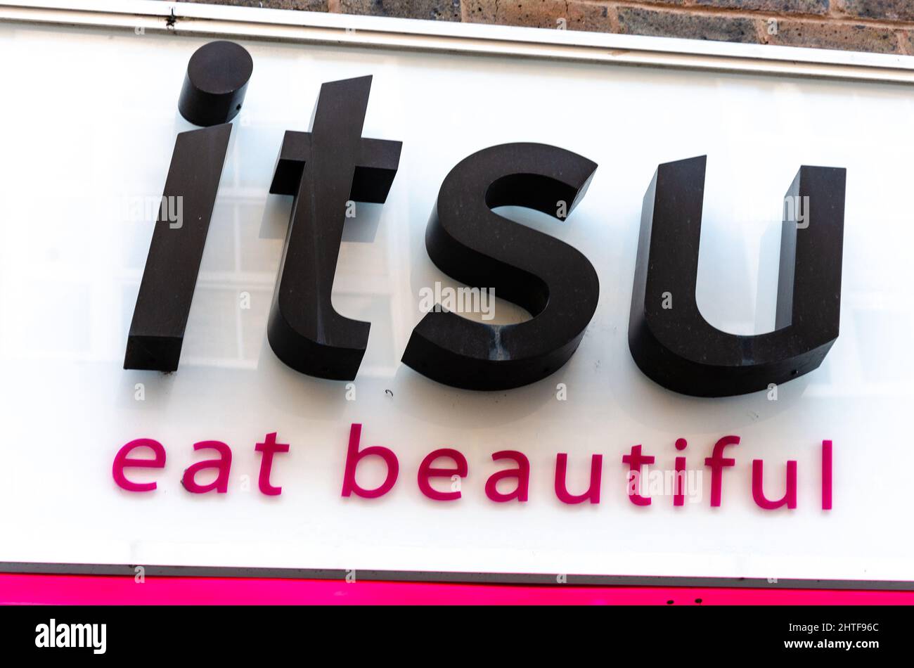 Close up view of the itsu branding on the outside of one of it's stores ...