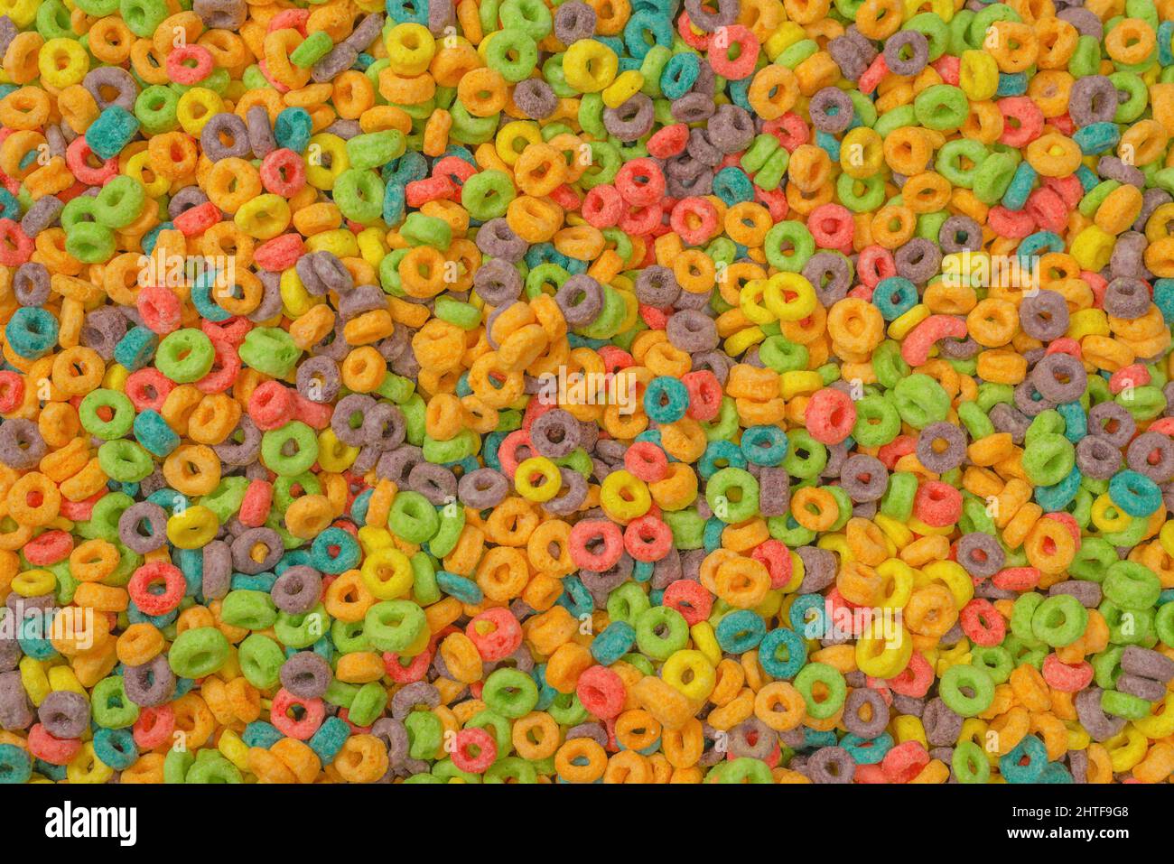 Sweet multicolored flakes, cereal loops as a background Stock Photo - Alamy