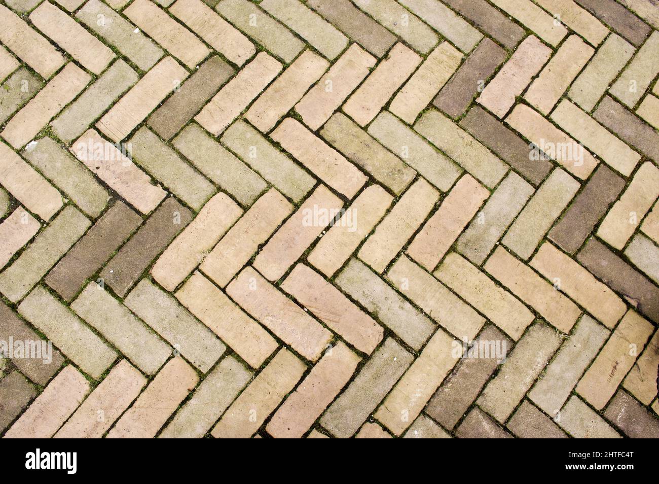Light and dark brown street brick pattern background Stock Photo - Alamy