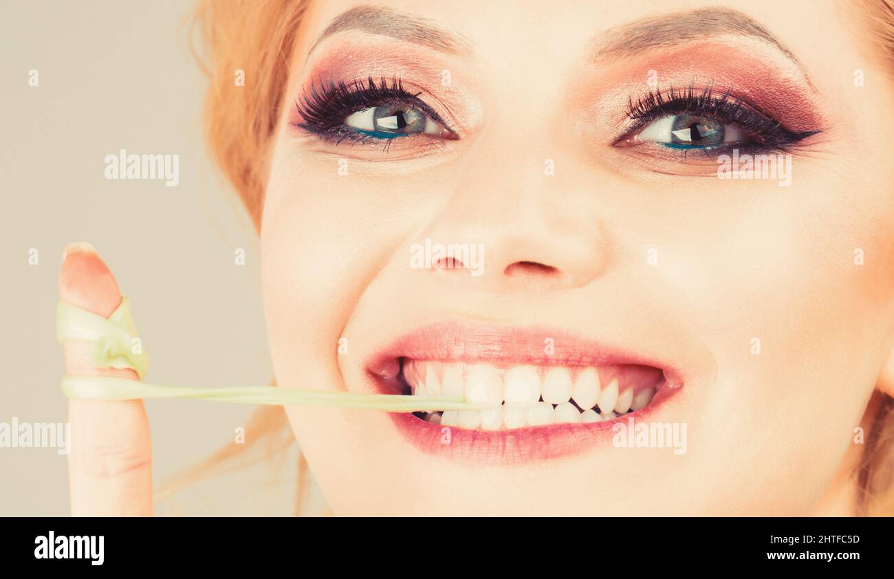 Closeup face, smile. Woman makeup, bubblegum, gum.Bubble chewing girl ...