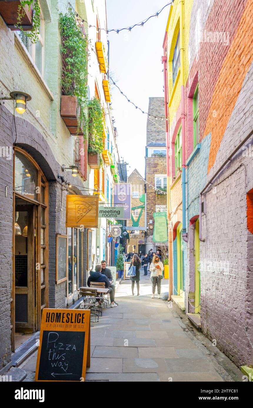Neal's yard, brightly coloured passageways and a courtyard, tourist ...