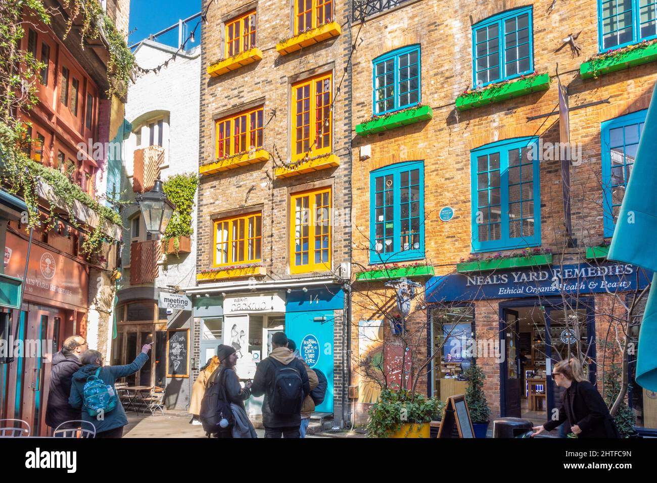 Neal's yard, brightly coloured passageways and a courtyard, tourist ...