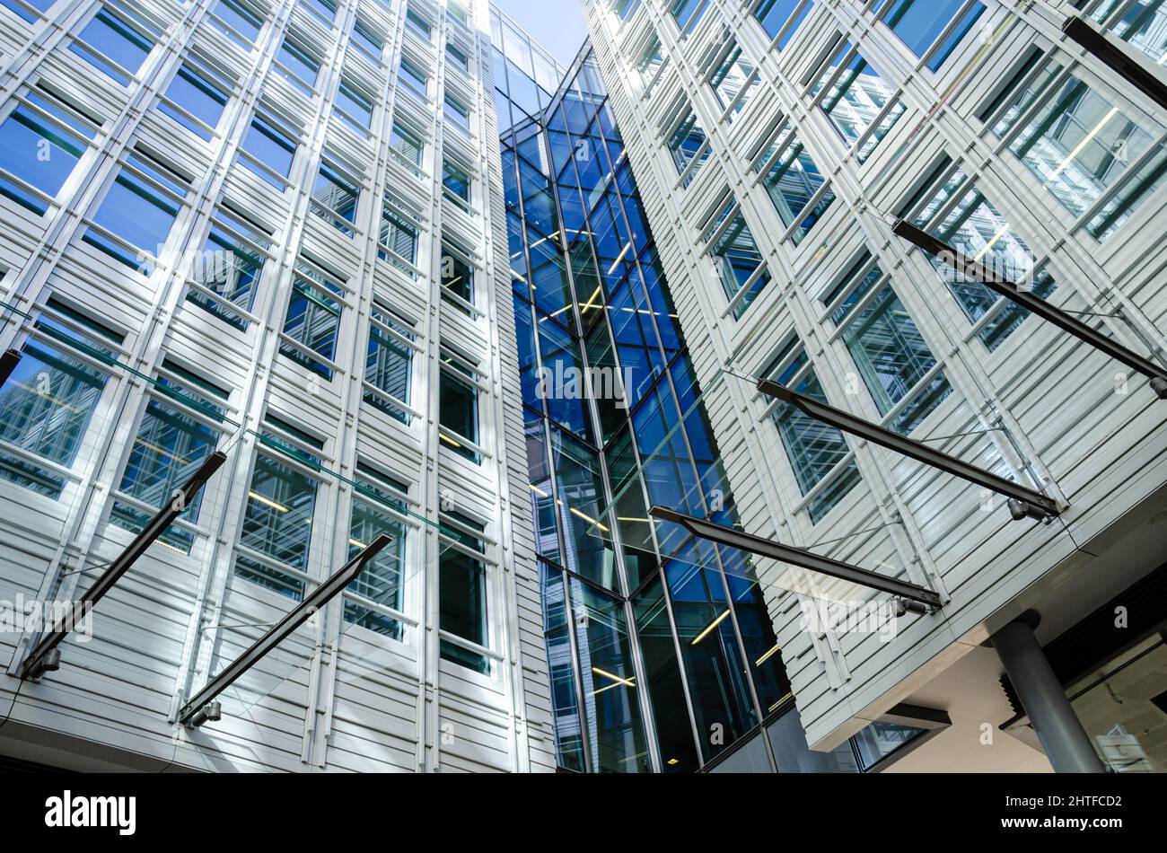 A view looking up at a contemporary, modern office block in the Central ...