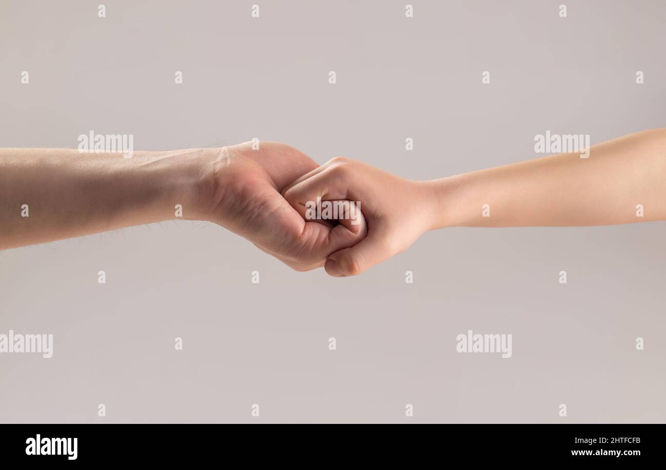 Woman and kid hands connect with each other. Friendly handshake ...