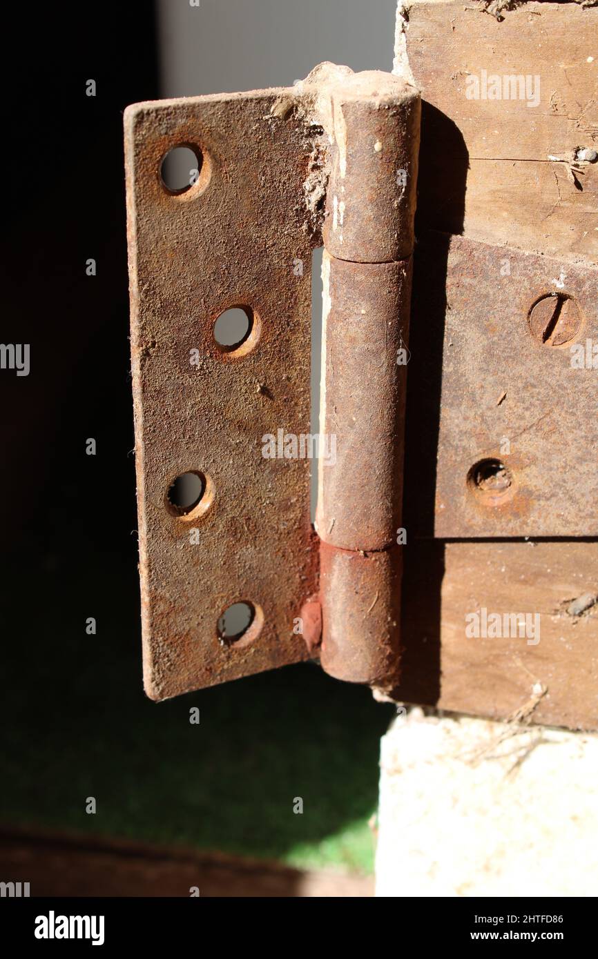 Broken door hinge hi-res stock photography and images - Alamy