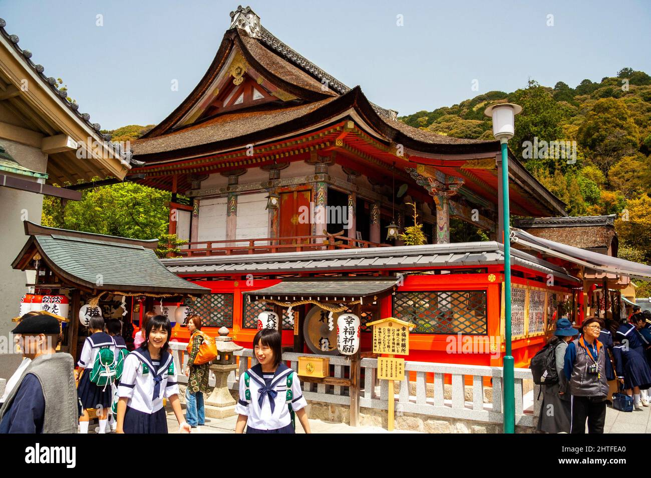 Japanese people and school children outside the Jishu shrine in ...