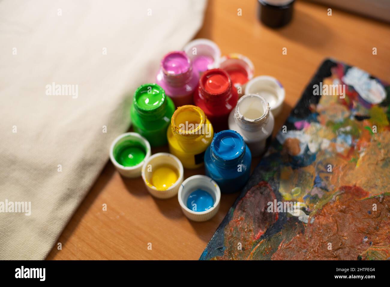 Top view of colorful paint pots for crafts Stock Photo - Alamy