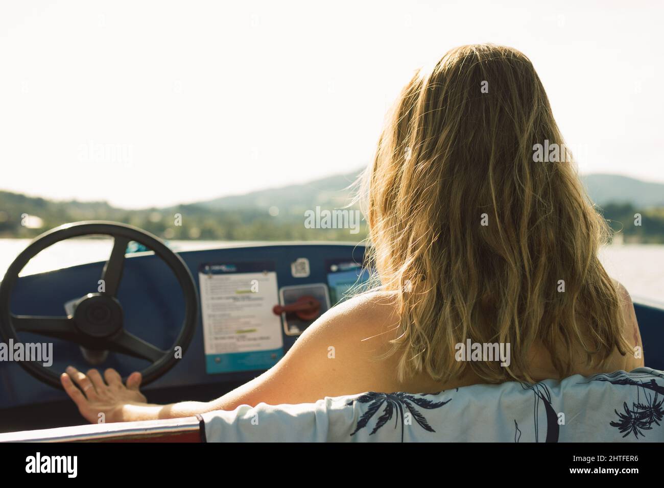 Girl driving a boat hi-res stock photography and images - Alamy