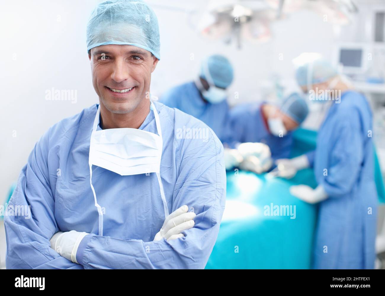 I have a team of surgical experts behind me. Portrait of a happy ...