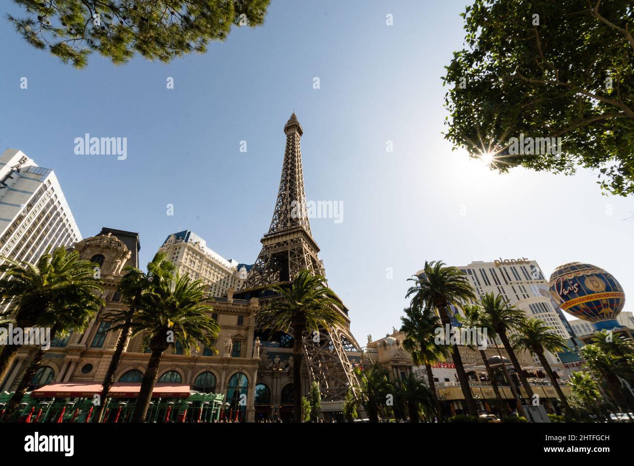 Low angle of the Eiffel Tower replica under the blue sky in Las Vegas Stock Photo - Alamy