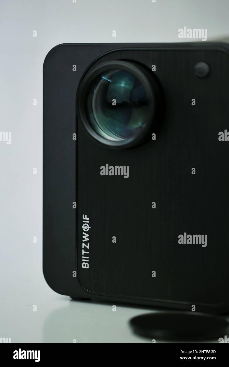 Photo of Blitzwolf portable projector with remote control isolated on a ...